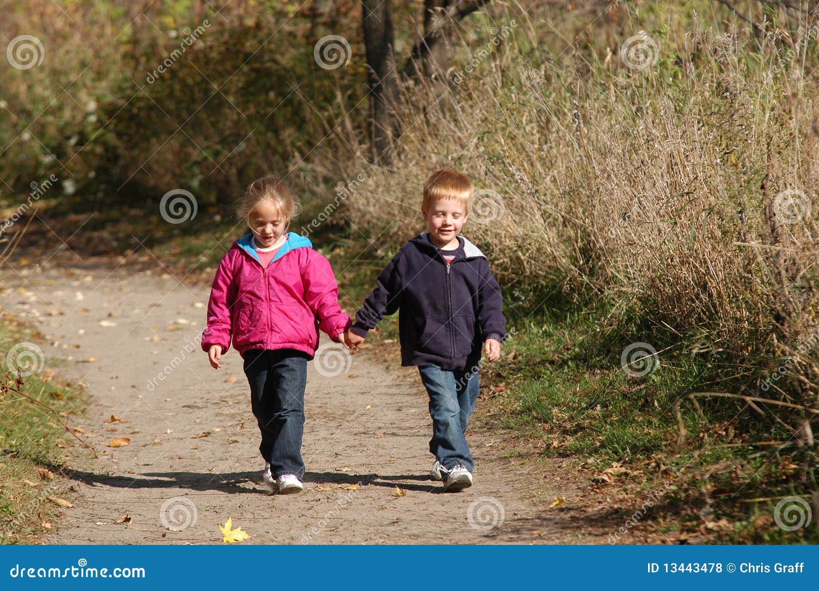 Walking Hand in Hand stock photo. Image of adorable, friend - 13443478