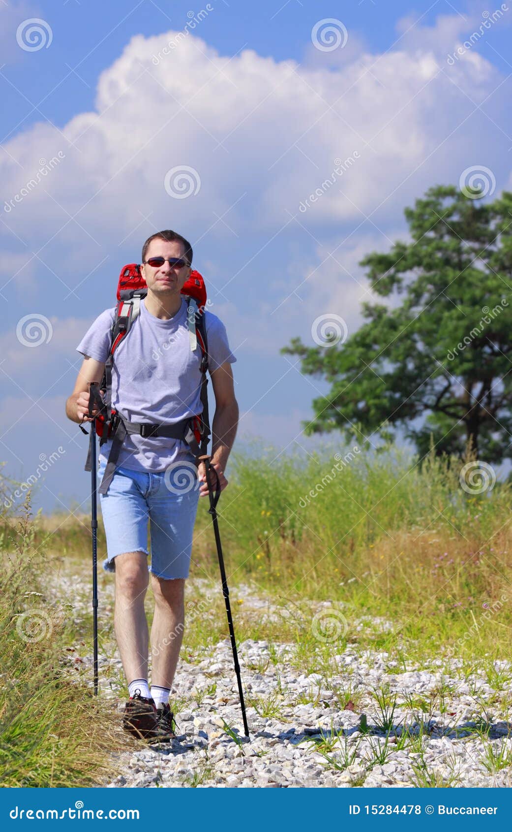 Walking Hiker on Stony Path Stock Photo - Image of caucasian, blue ...