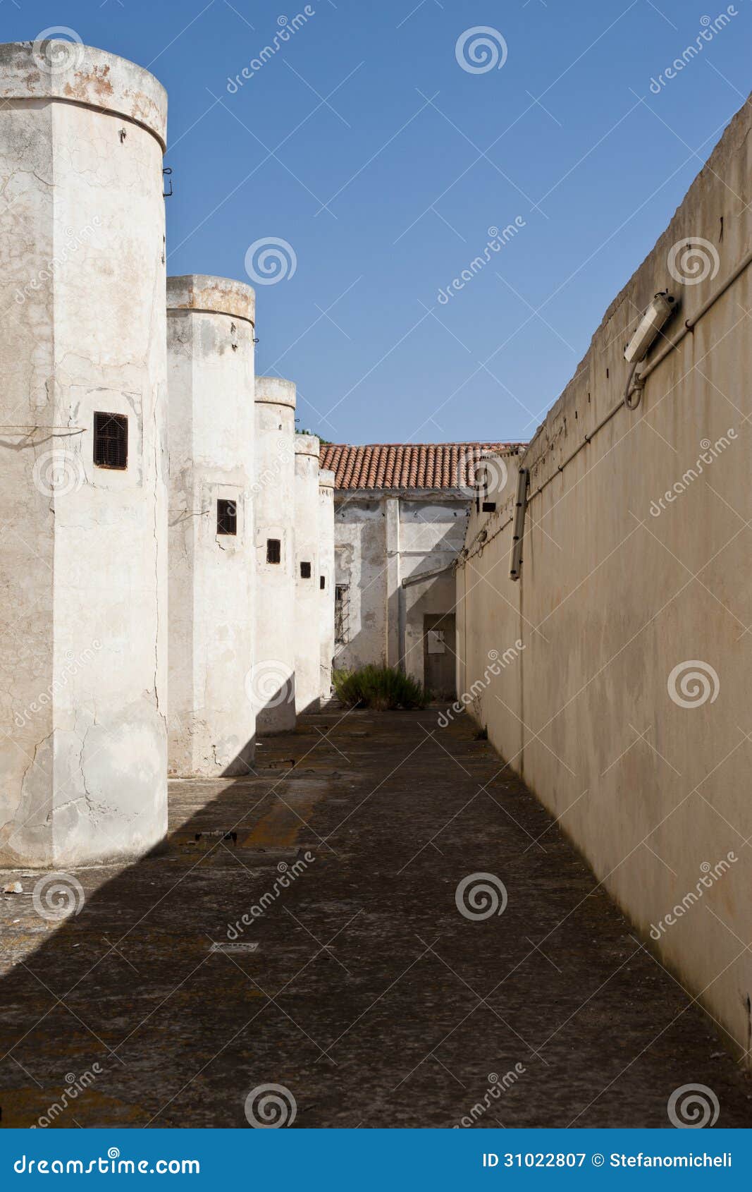 Walking in the Jail Courtyard Stock Image - Image of courtyard, danger ...