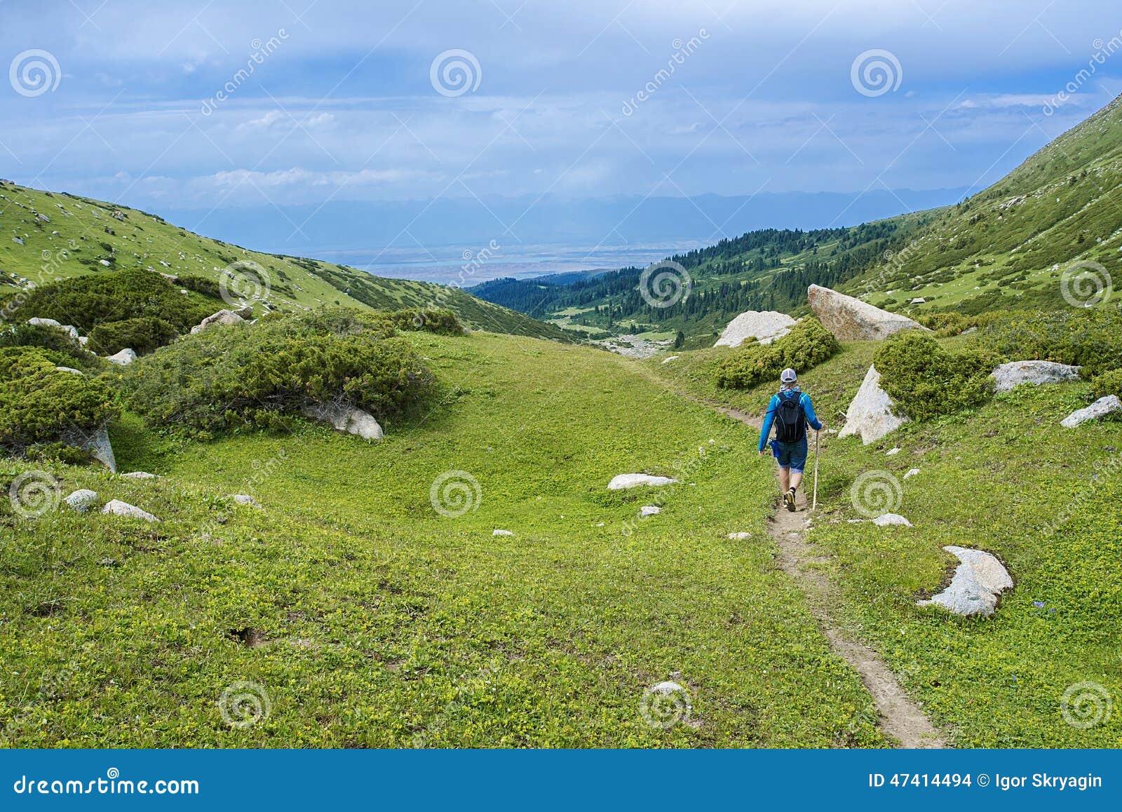 Walking in mountains stock photo. Image of bags, trekking - 47414494