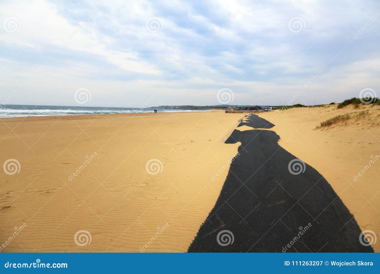 Walking path on sand beach stock image. Image of bench - 111263207