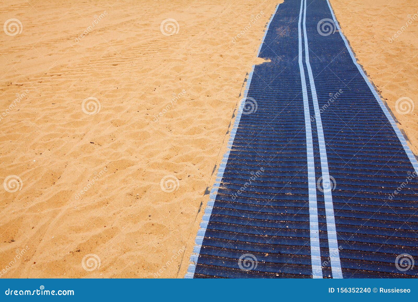 Walking path on the beach stock photo. Image of sand - 156352240