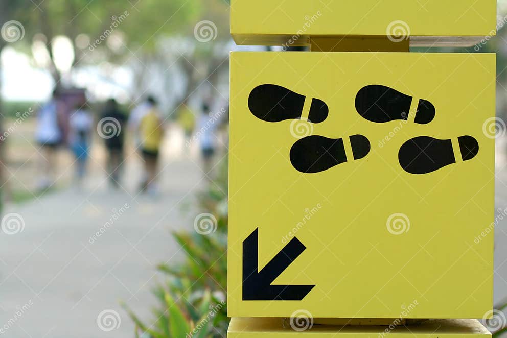 Walking path sign this way stock image. Image of line - 6705205