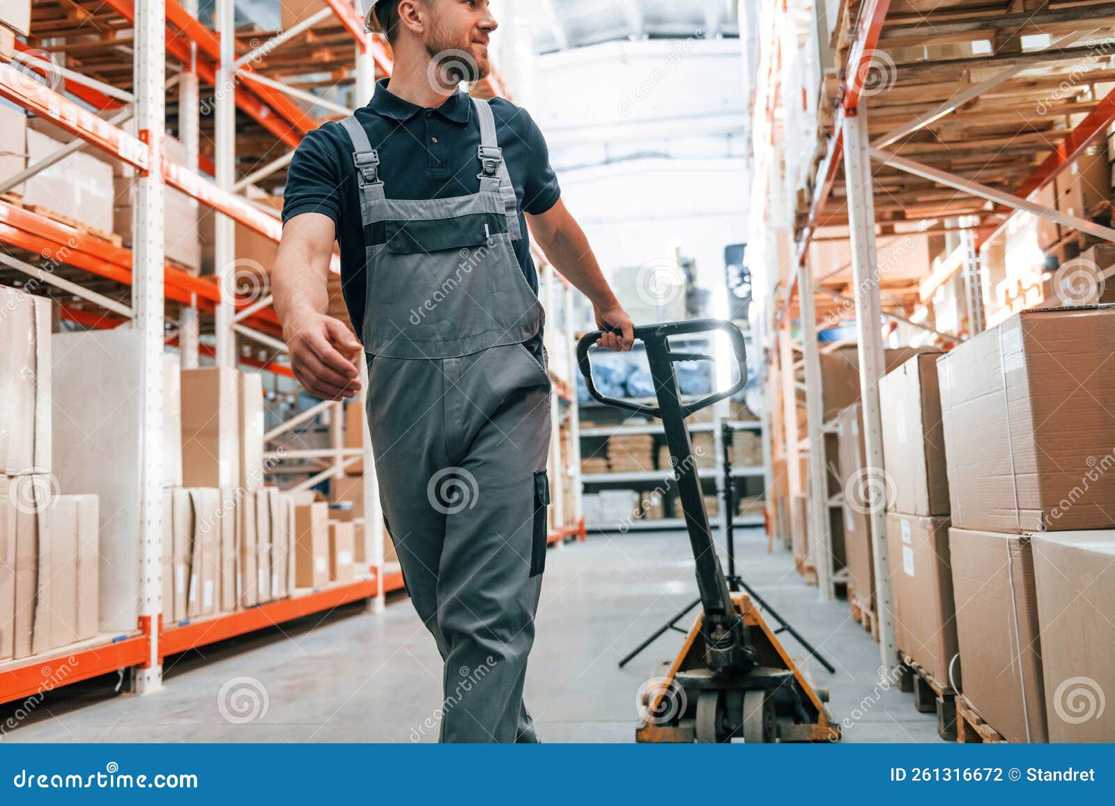 Walking with Platform Trolley. Employee in Uniform is Working in the ...