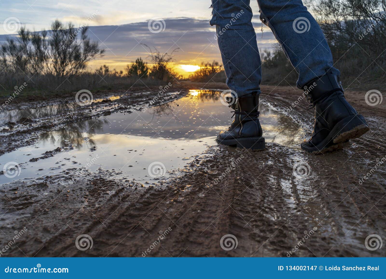 Walking through a Puddle with Military Boots. Stock Image - Image of ...
