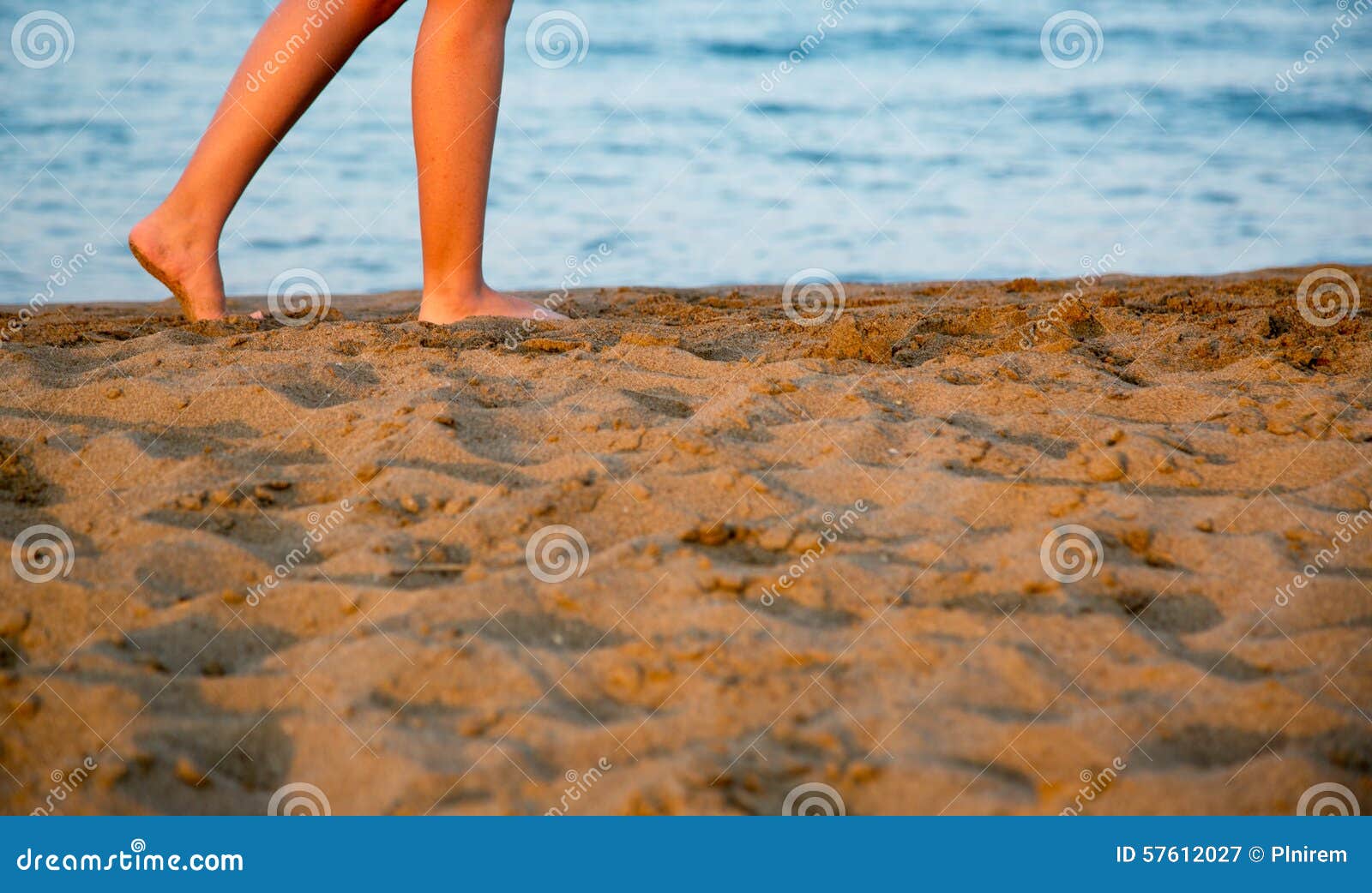 Walking on sand beach stock image. Image of beach, postcard - 57612027