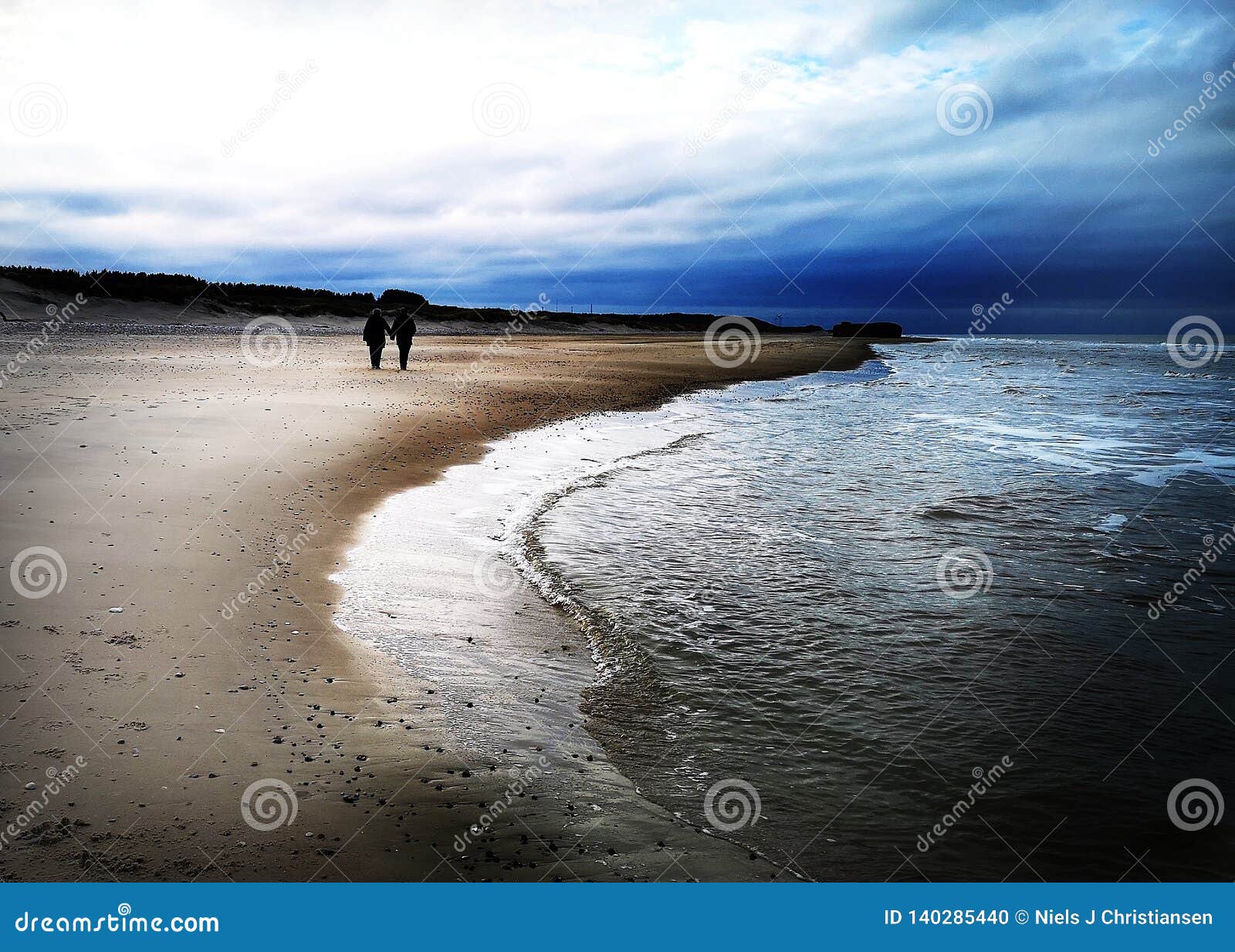 Walk by the sea stock photo. Image of walking, sandy - 140285440