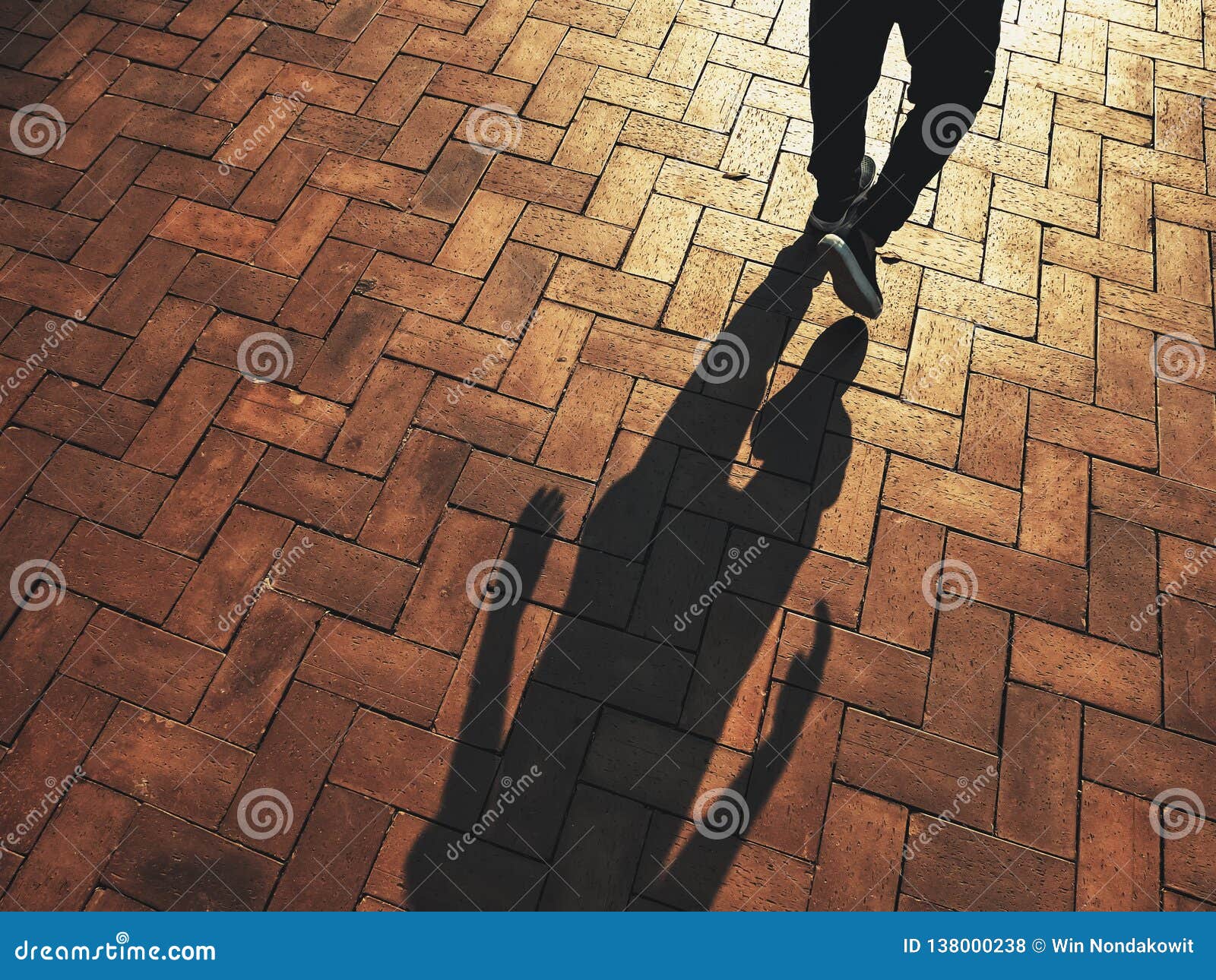 Walking with shadow stock photo. Image of shadow, stone - 138000238