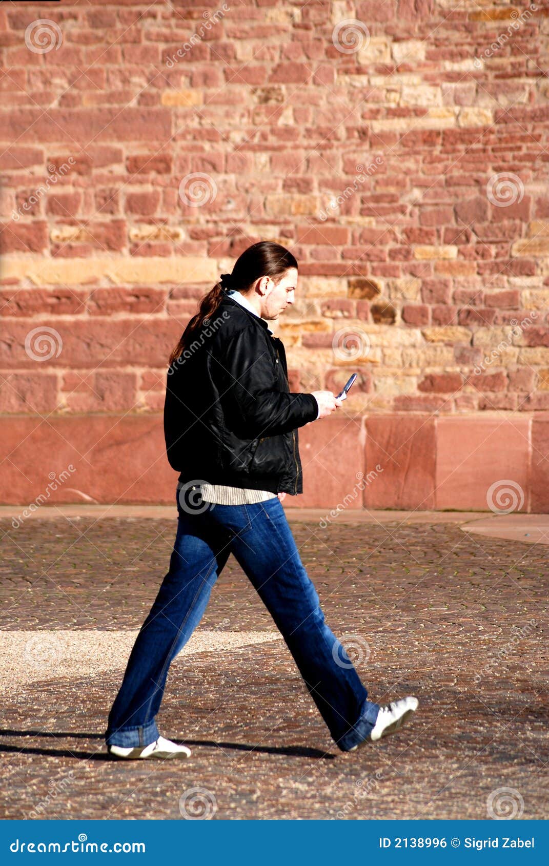 Walking sms man stock photo. Image of typing, business - 2138996