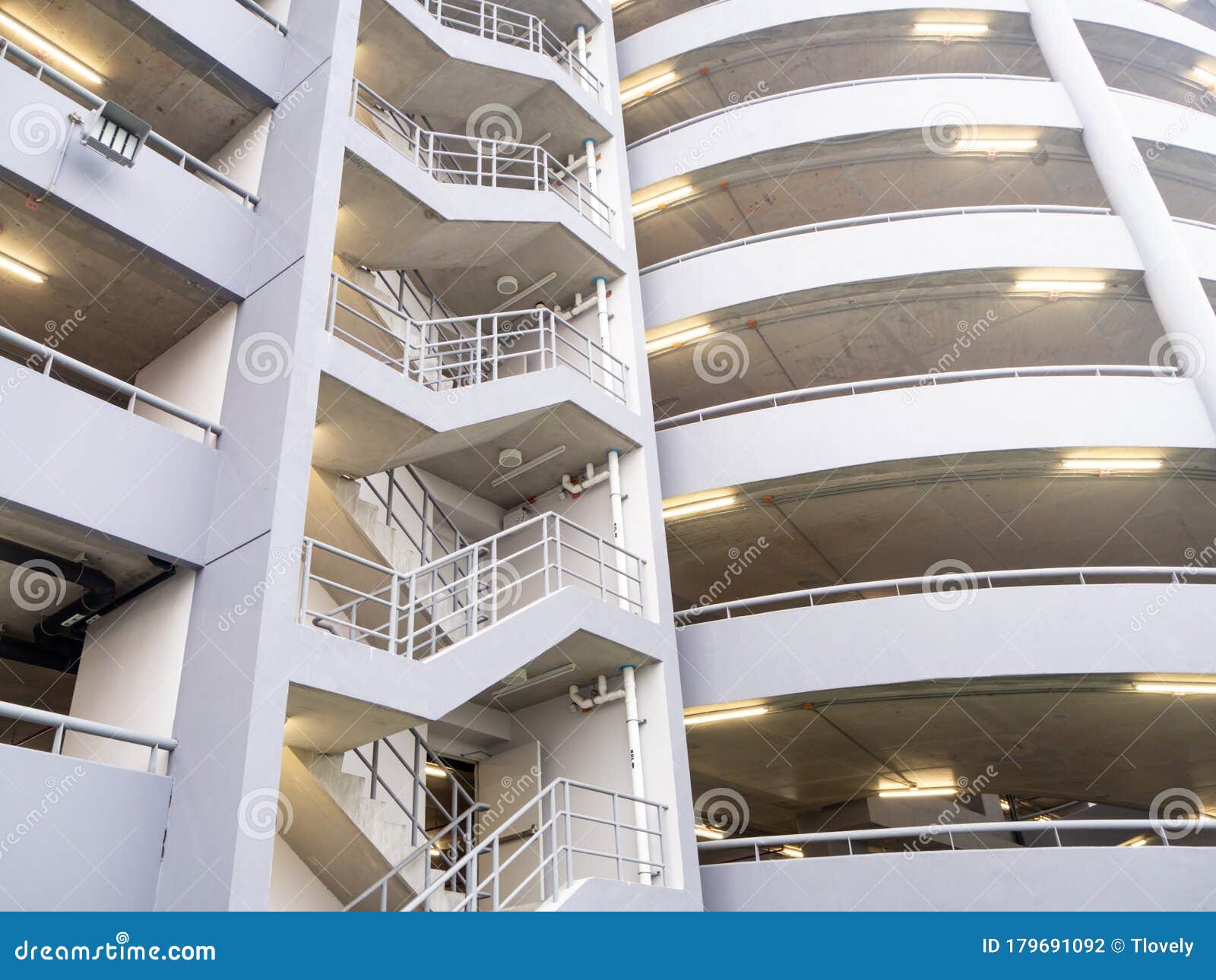 Walking Stair on the Side of a White Multi Storey Parking Lots Building ...