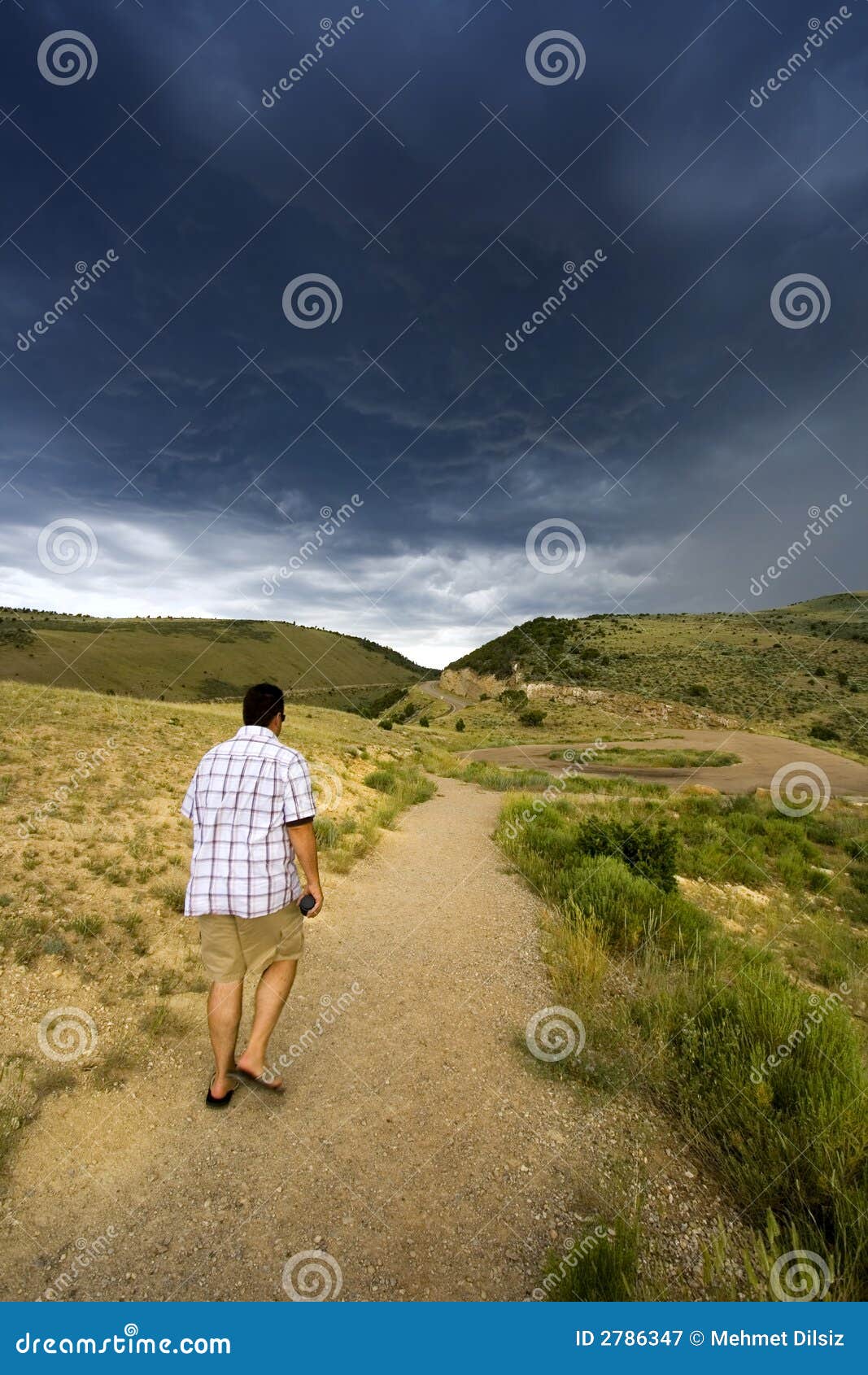 Walking into the Storm stock image. Image of clouds, rocky - 2786347