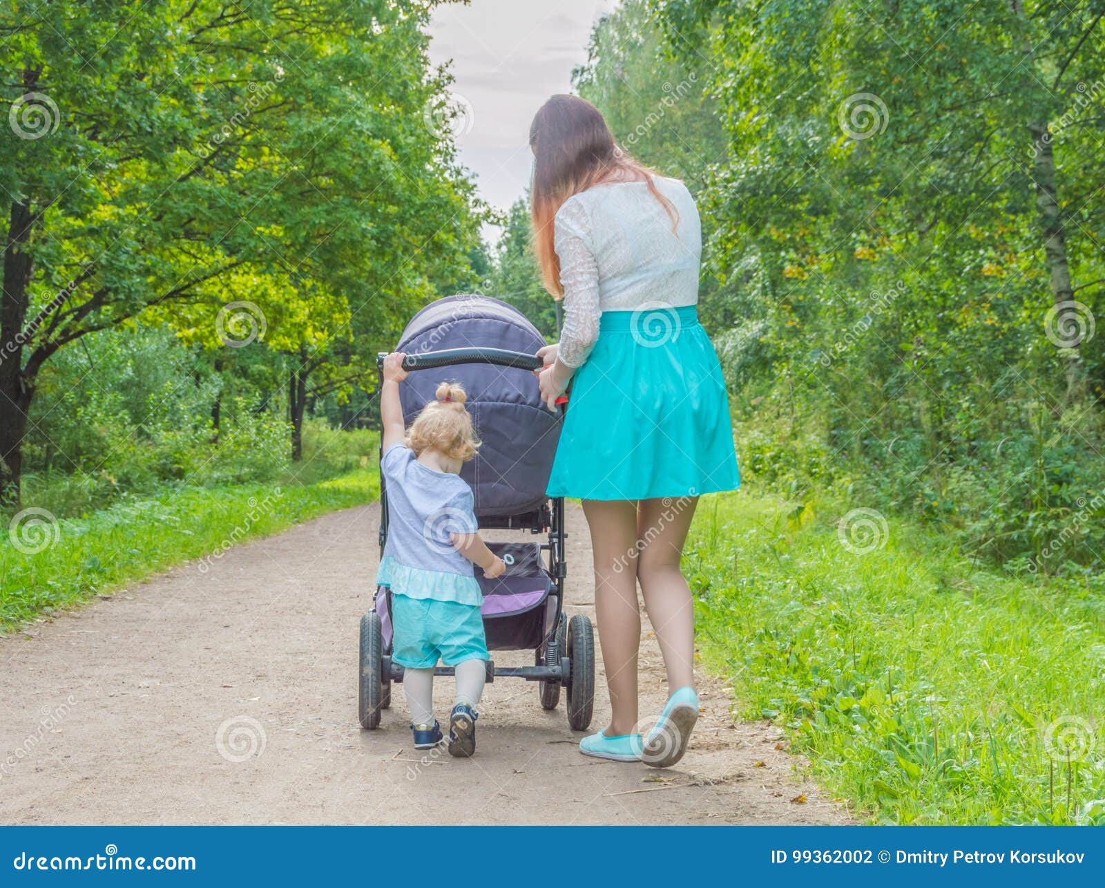 Child in the Park Pushing a Stroller. Stock Photo - Image of childhood ...