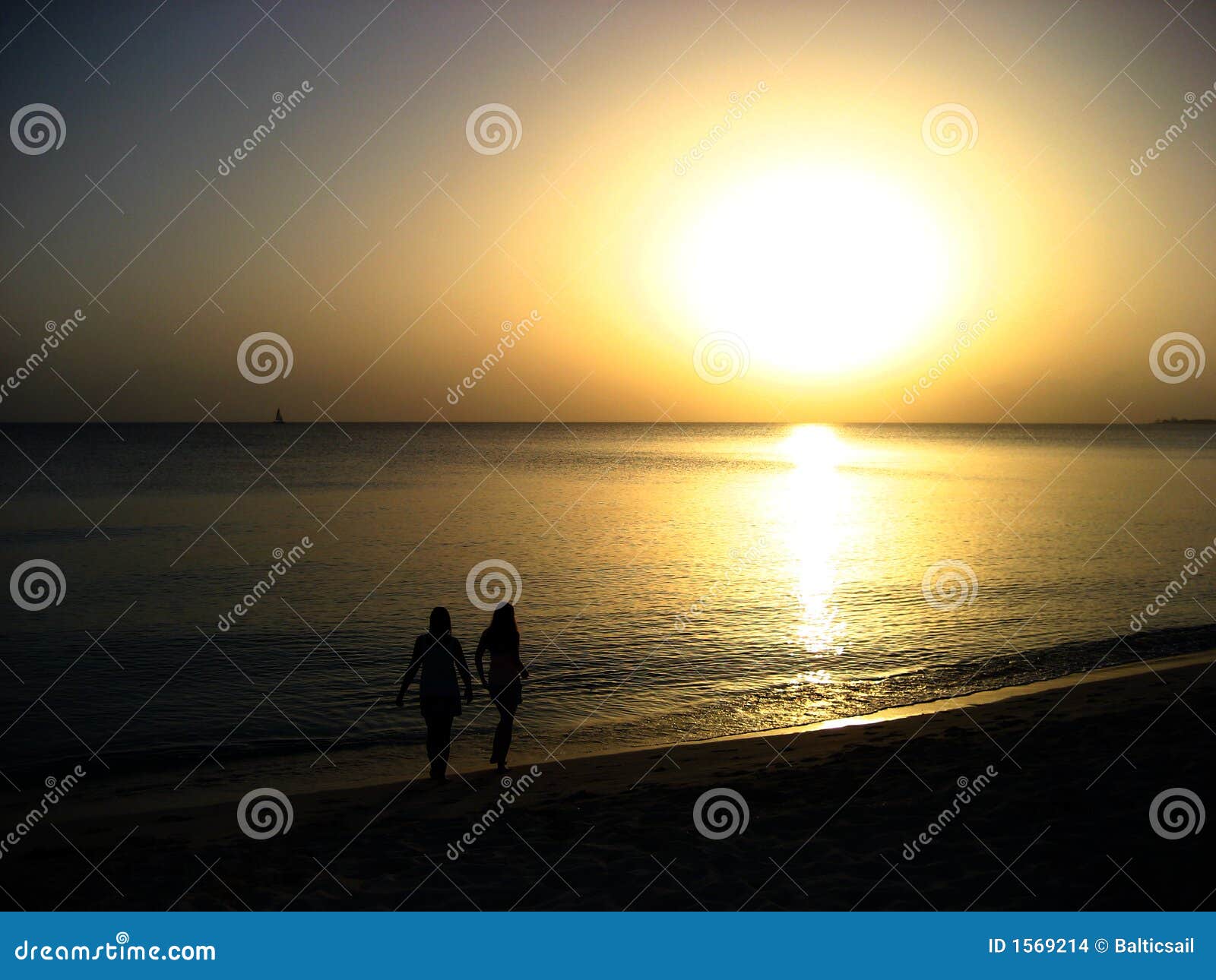 Walking into the Sunset stock photo. Image of teens, ocean - 1569214