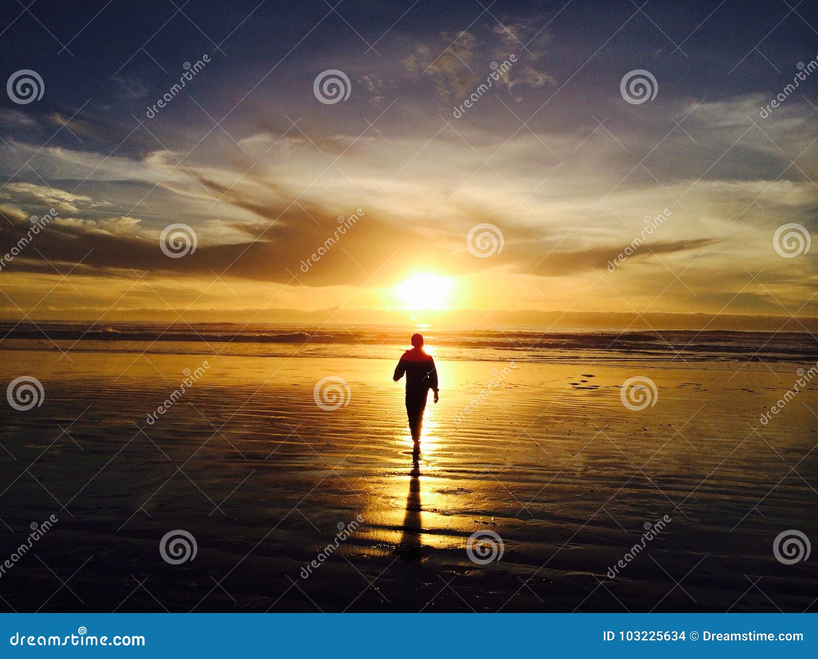 Walking into the Sunset stock photo. Image of clouds - 103225634