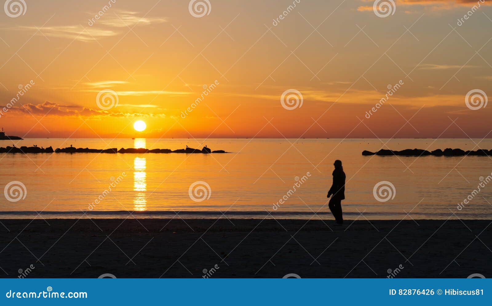 Walking at sunset stock photo. Image of water, night - 82876426