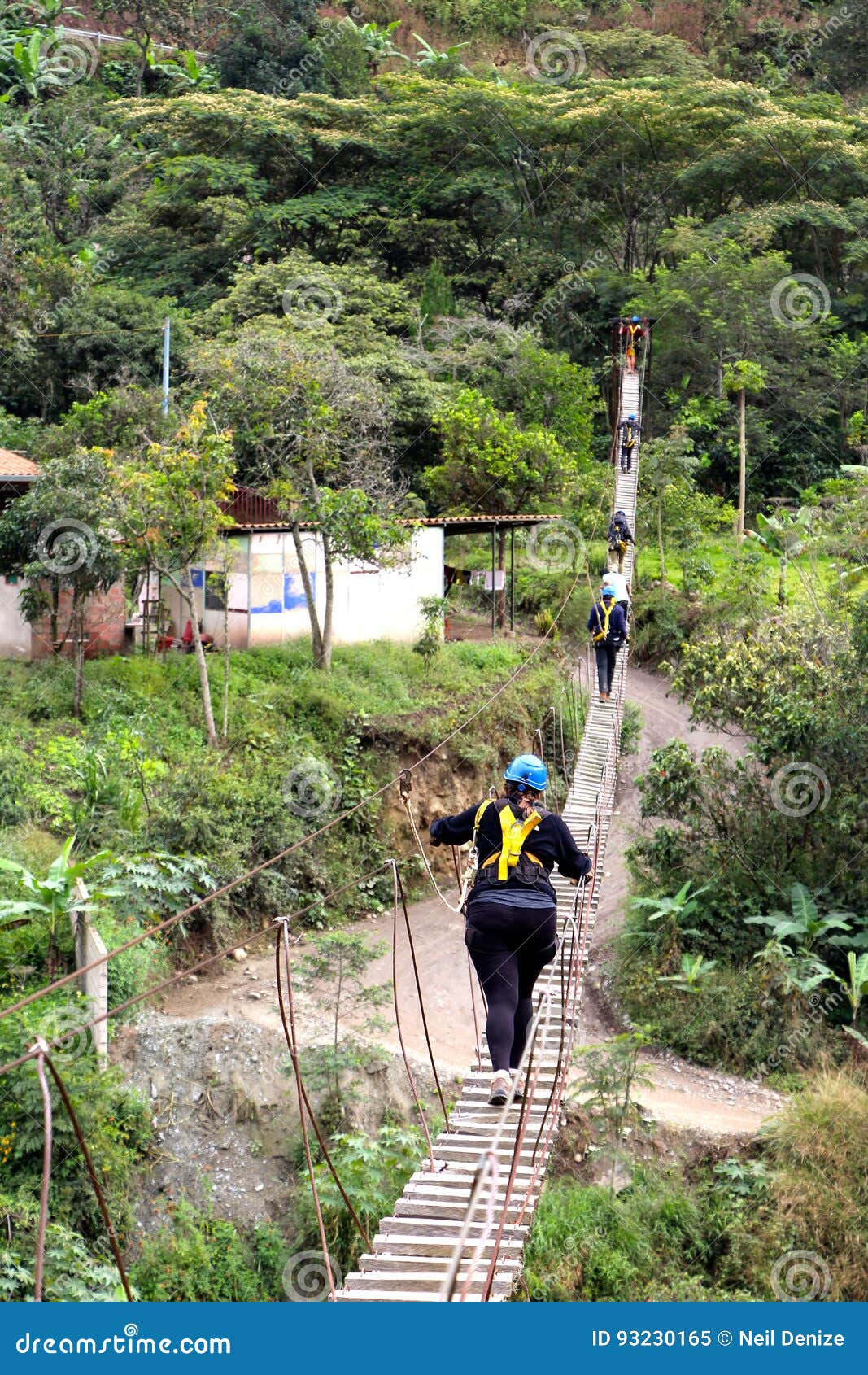 Walking the wobbly bridge editorial image. Image of enjoying - 93230165
