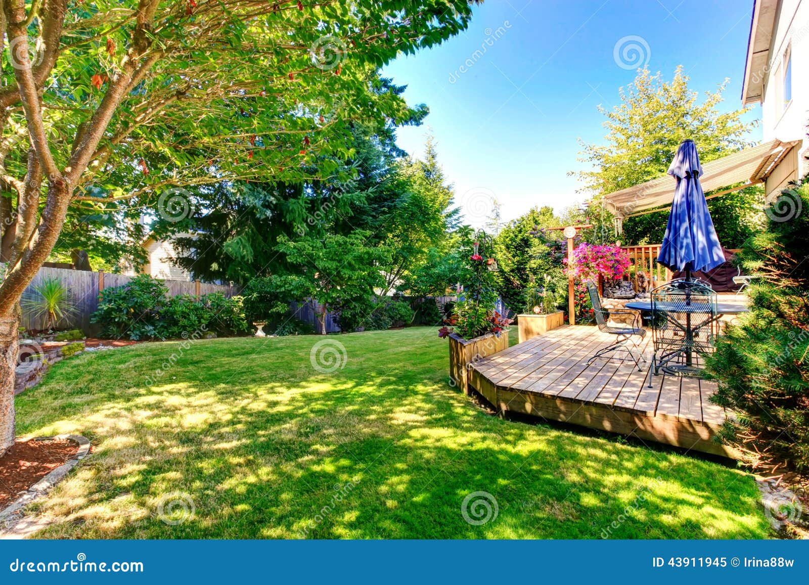 Walkout Deck with Patio Table and Umbrella Stock Image - Image of ...