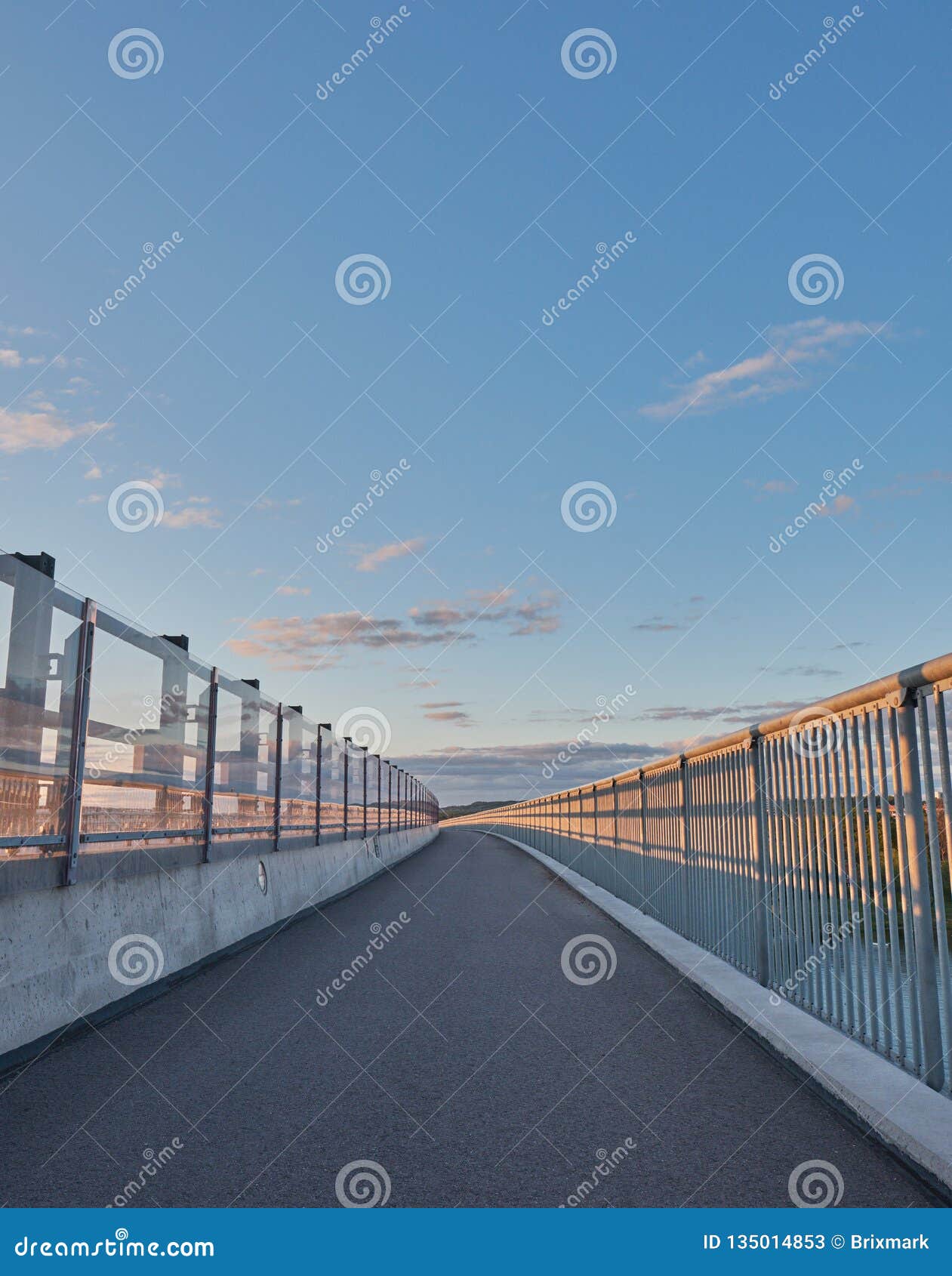 Walkway across a bridge stock image. Image of bars, sunny - 135014853