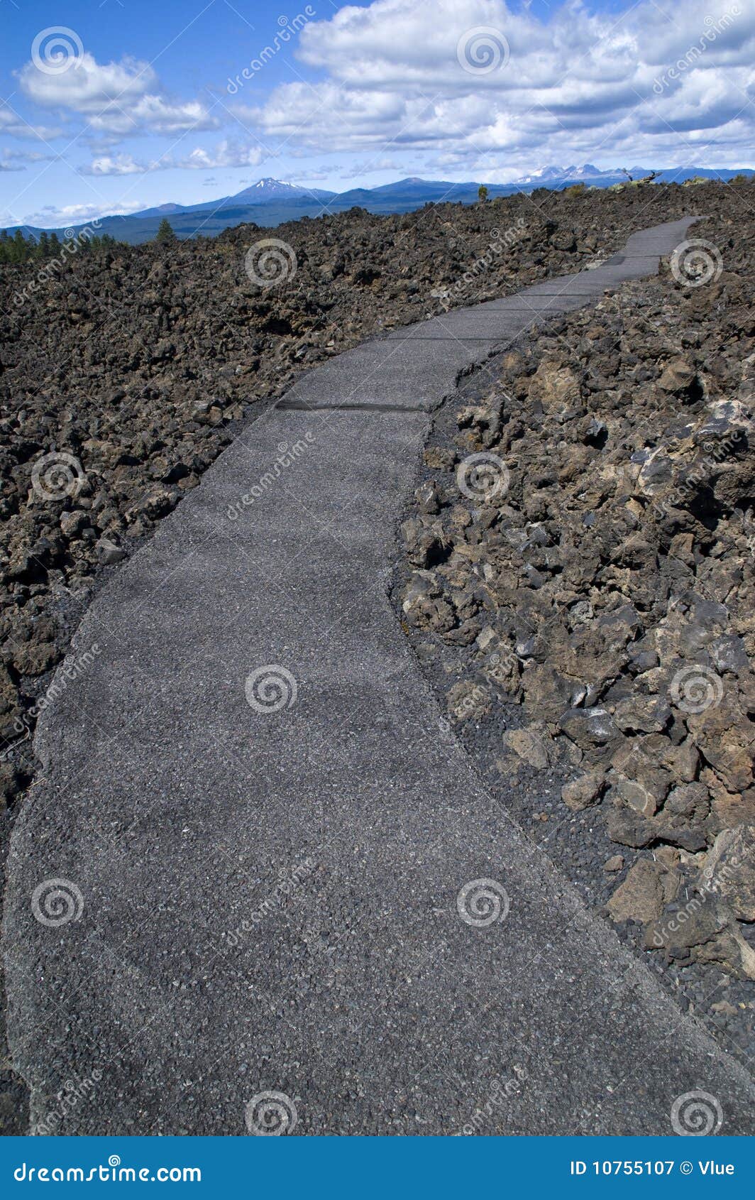 Walkway Going through Lava Rock Stock Image - Image of clouds, mountain ...