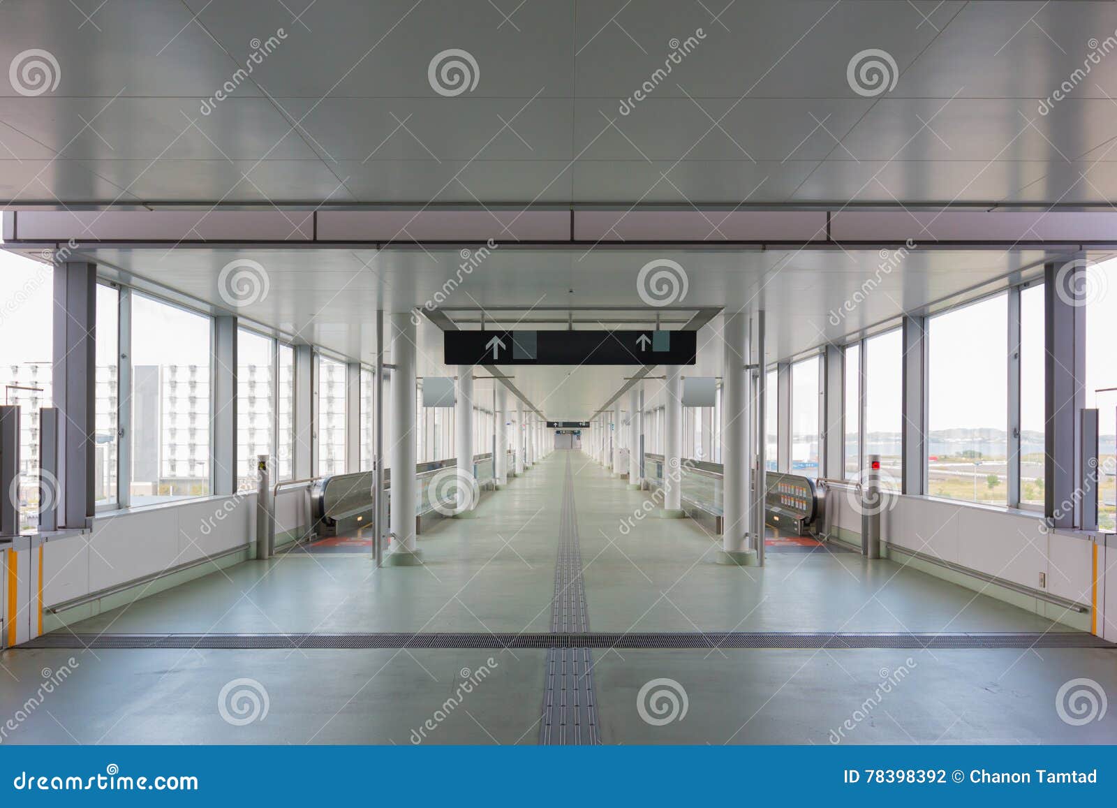 Walkway with Long Horizontal Escalator at International Airport Stock ...