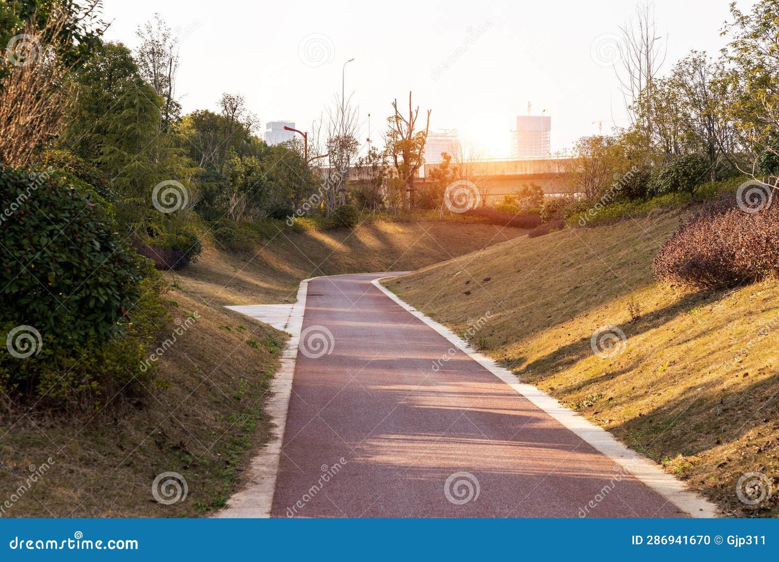 Walkway in the modern city stock photo. Image of season - 286941670
