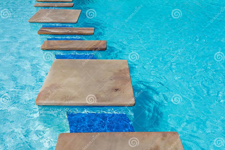 Walkway in swimming pool stock photo. Image of concept - 95878352