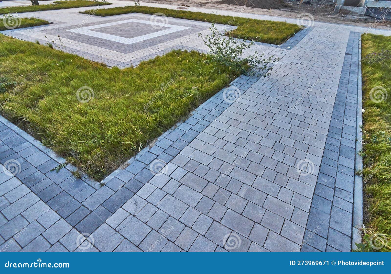 Walkways are Tiled. Newly Built Cottage with Pavement Paths. Textural ...