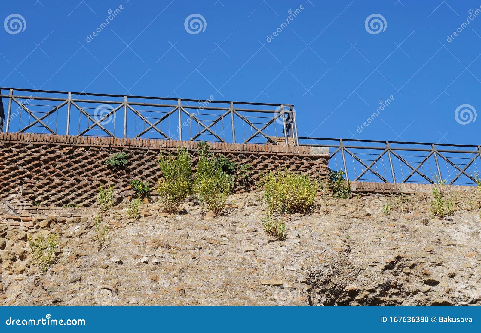 Wall of the ancient Rome stock photo. Image of archeology - 167636380