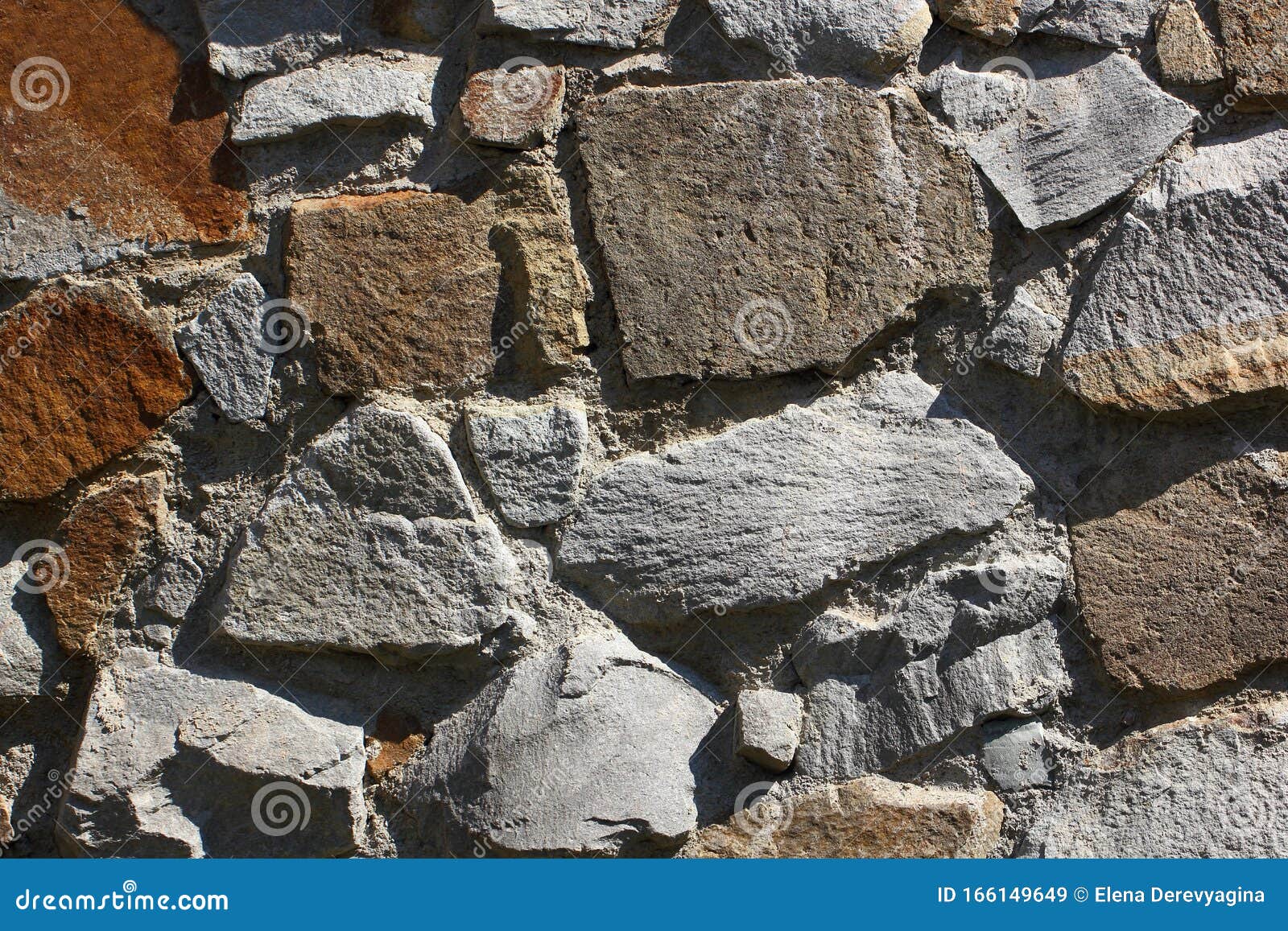 Wall Background Paved with Stones of Different Irregular Shapes on ...