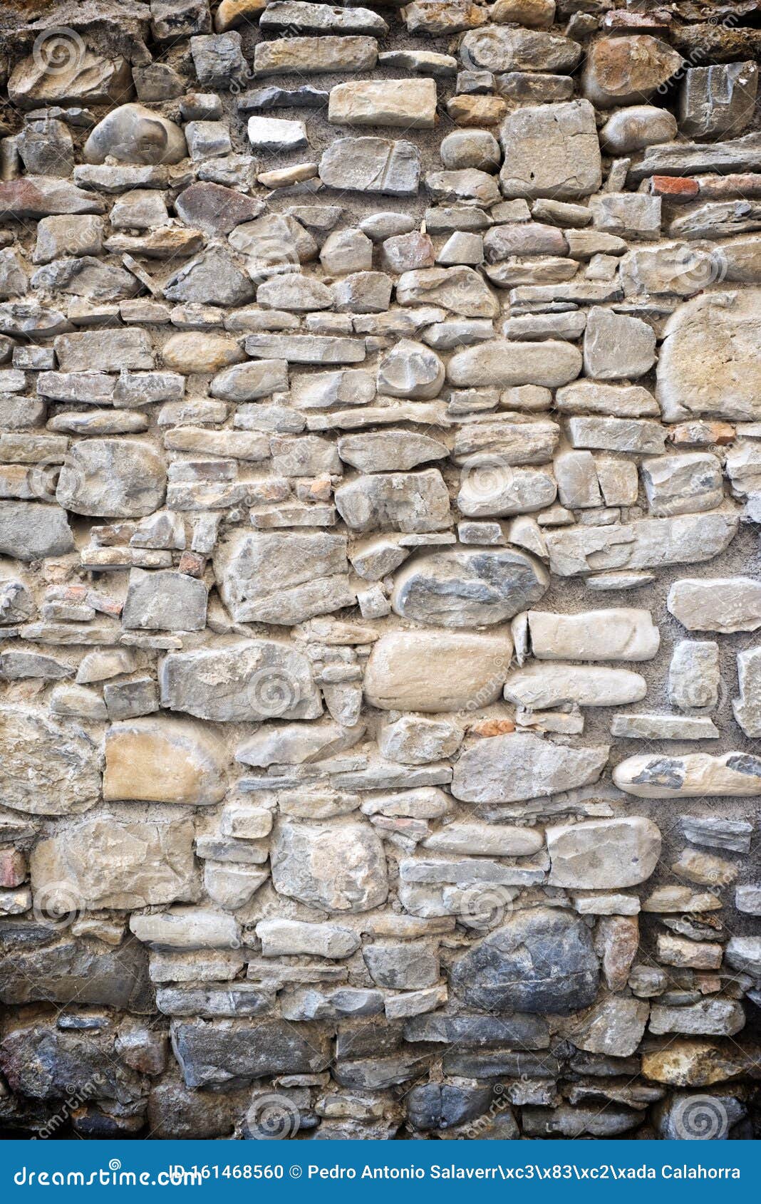 Stone wall view stock photo. Image of design, cobblestone - 161468560