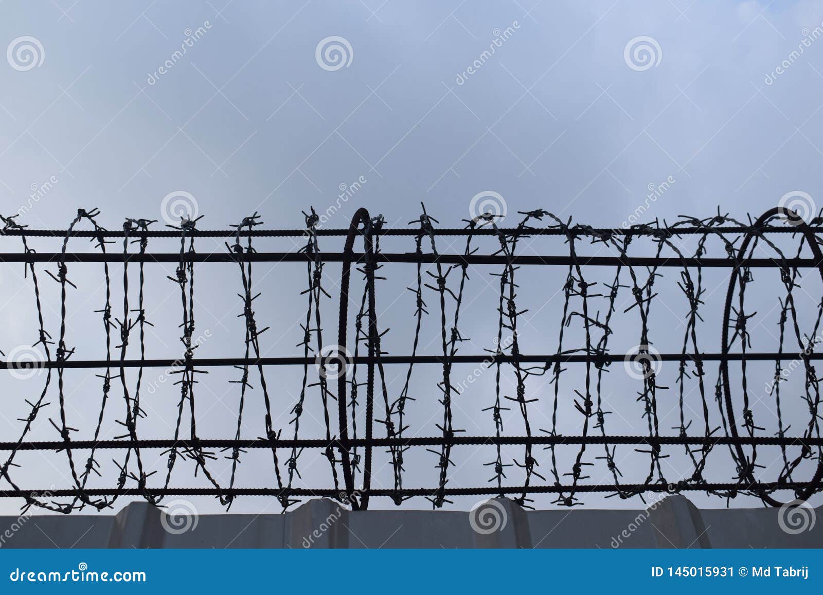 Wall Barbed Wire Fence for Security Stock Image - Image of wire, wall ...