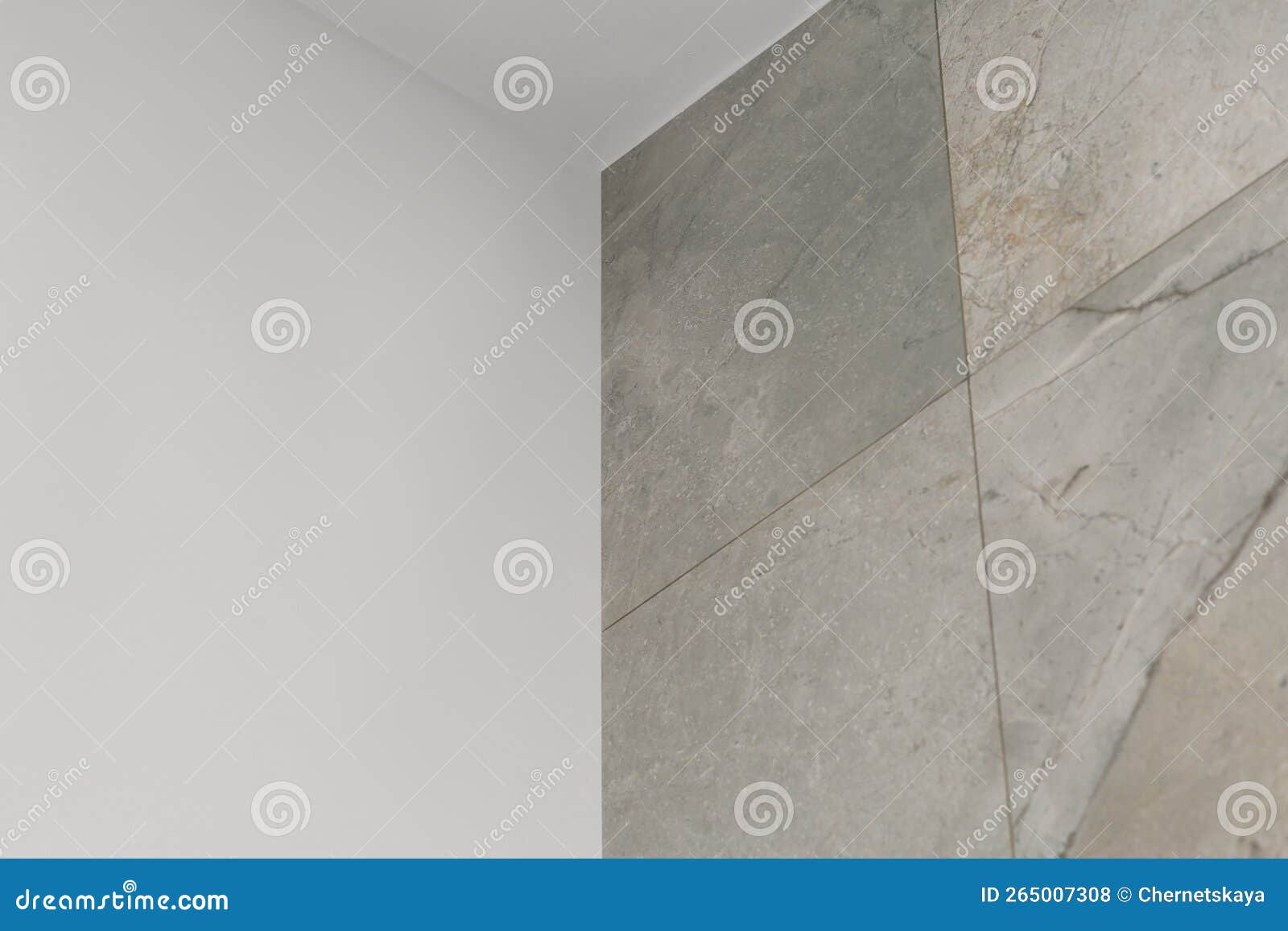 Wall with Beautiful Light Gray Marble Tiles Indoors, Low Angle View ...