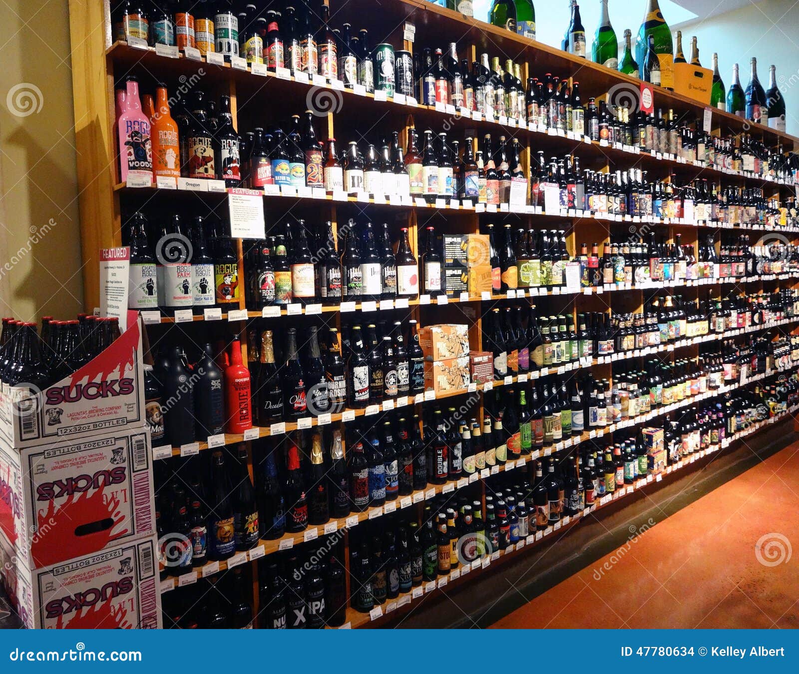 A Wall of Beer in a Supermarket Editorial Stock Image - Image of sale ...