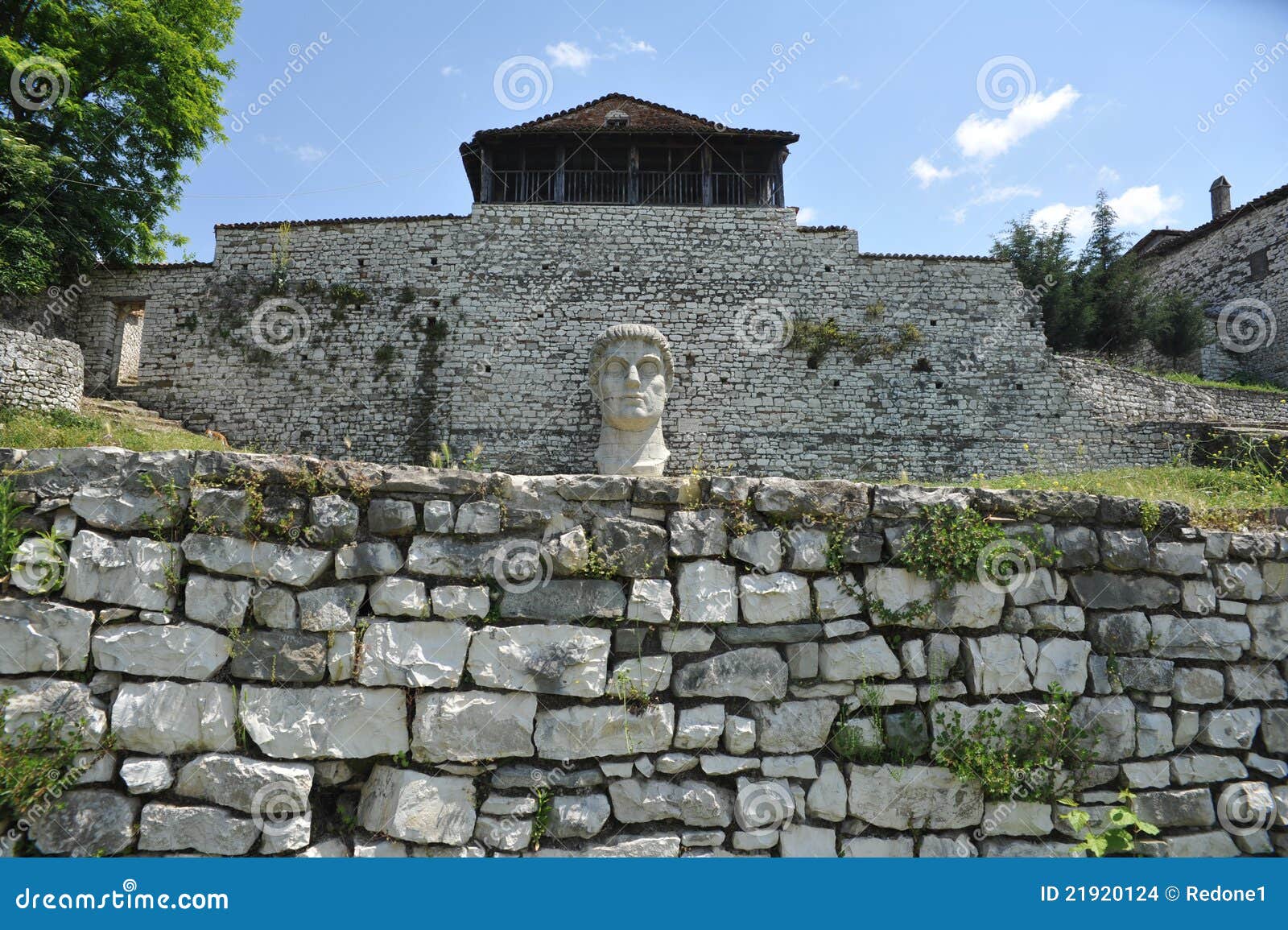 Wall and big stone head stock photo. Image of albania - 21920124