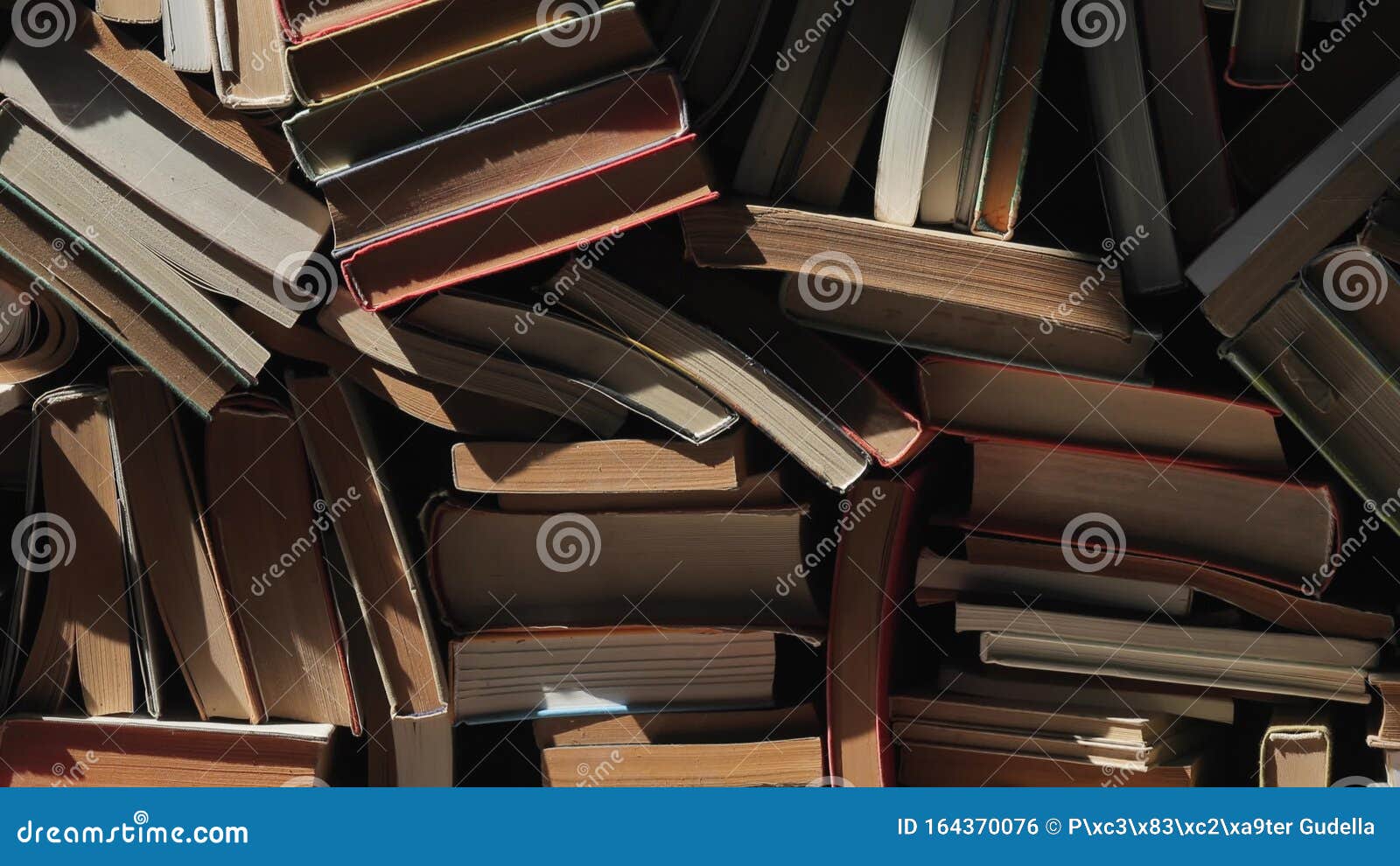 Wall of books piled up stock footage. Video of antique - 164370076