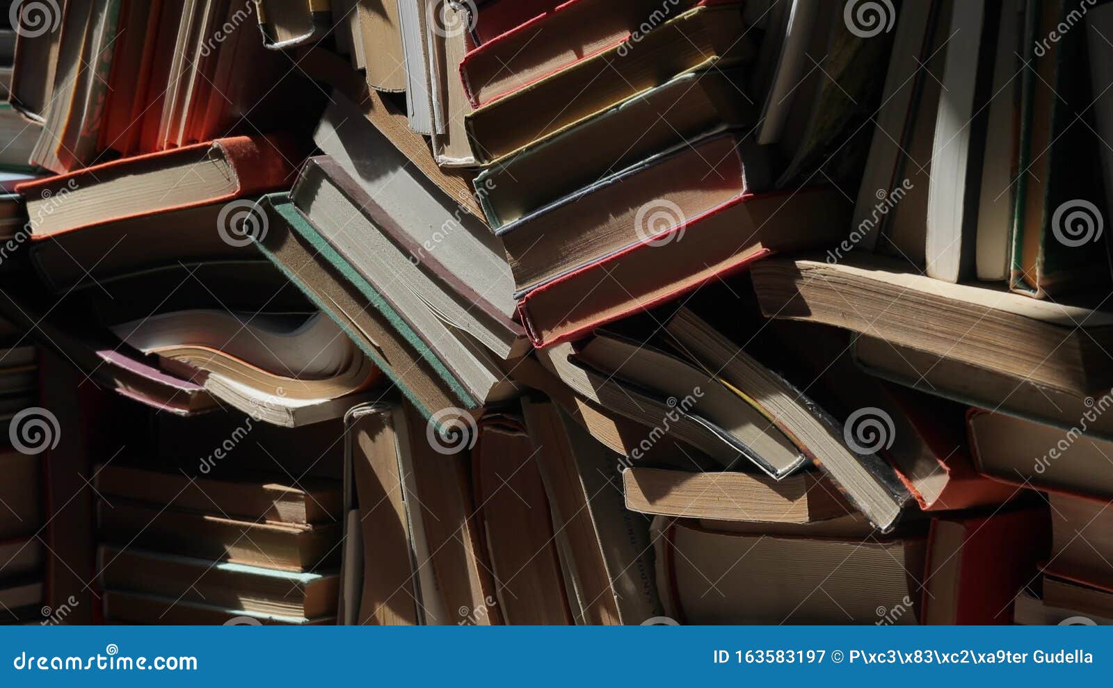 Wall of books piled up stock video. Video of attic, literature - 163583197