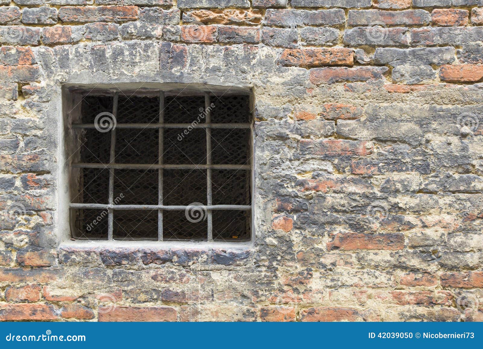 Wall of brick with grate stock photo. Image of ancient - 42039050