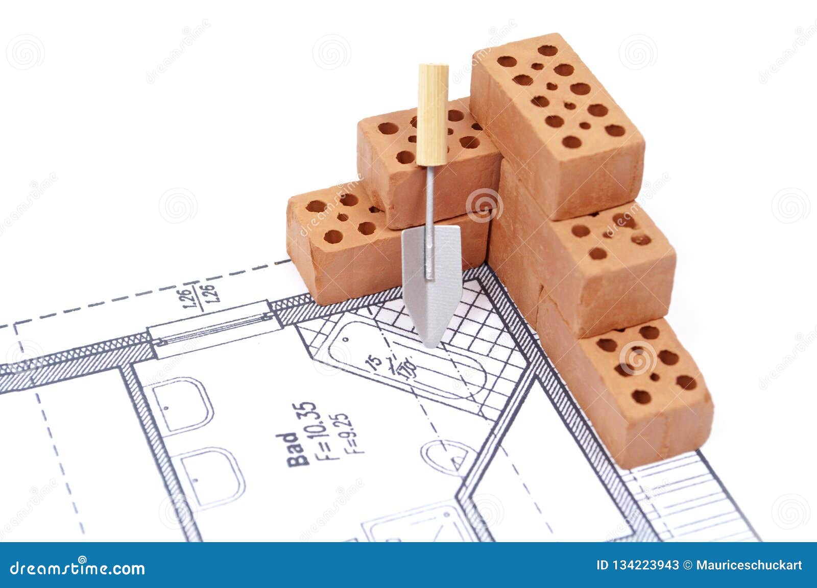 Wall of Bricks with a Construction Plan and a Excavator Stock Image ...