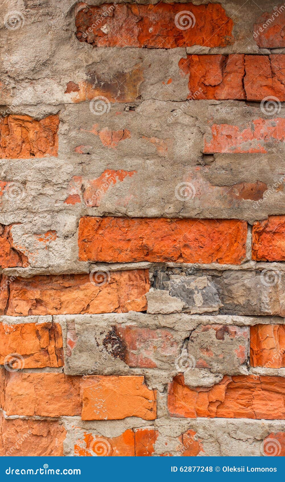 Wall of bright red bricks stock photo. Image of battered - 62877248