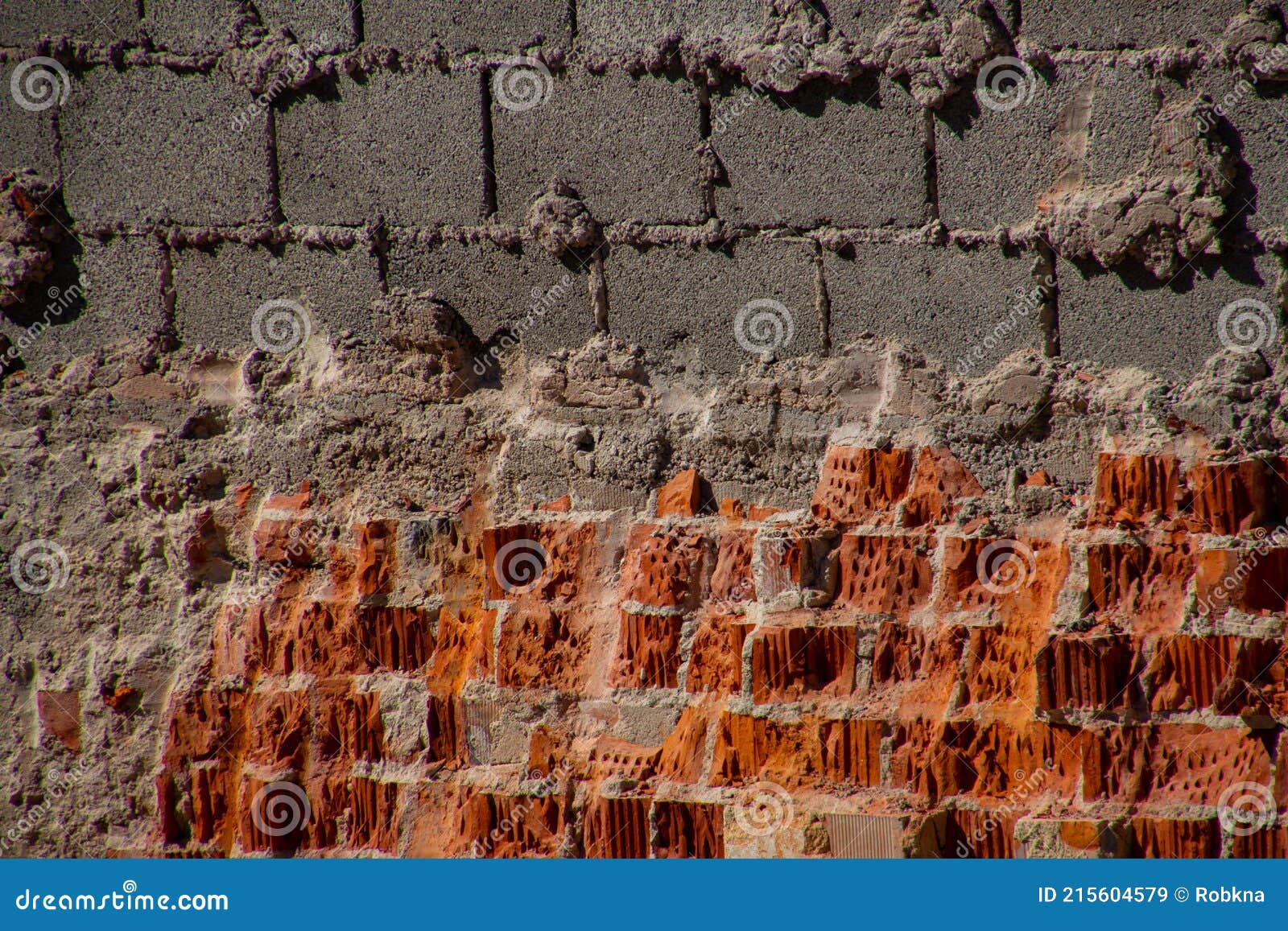 Wall of Broken Red Bricks and Gray Concrete Hollow Block Bricks Stock ...