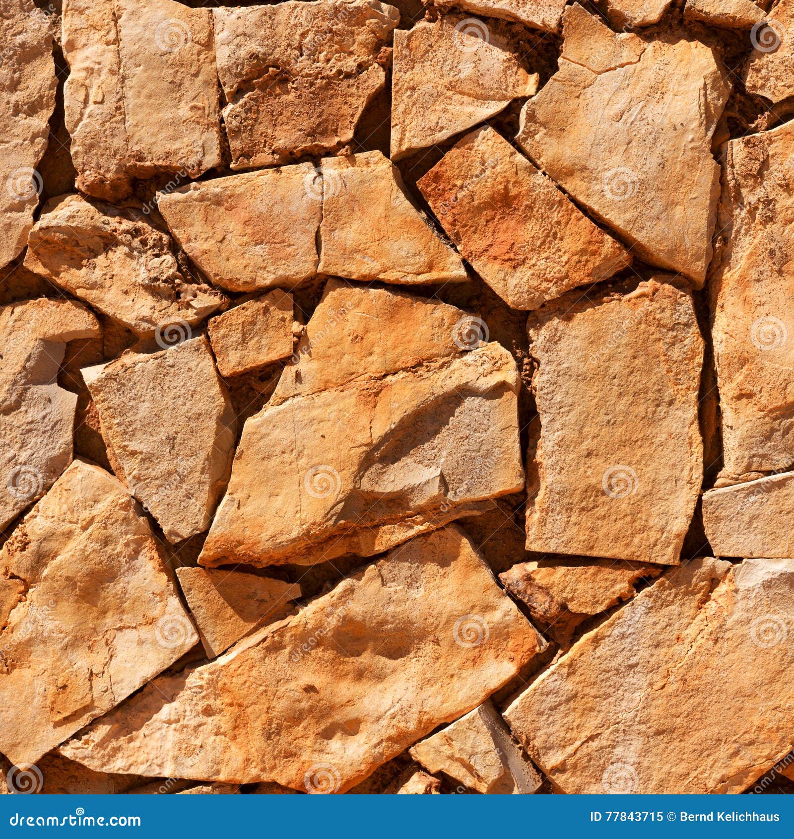 Wall of Brown Natural Stones Stock Image - Image of solid, rock: 77843715