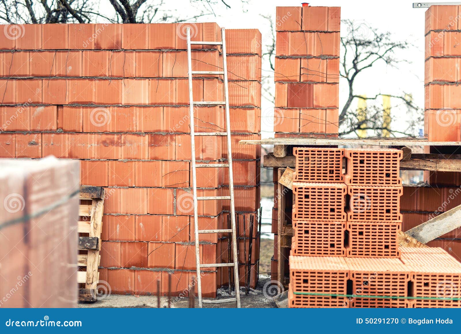 Wall Building with Professional Bricks, Construction Site of New House ...