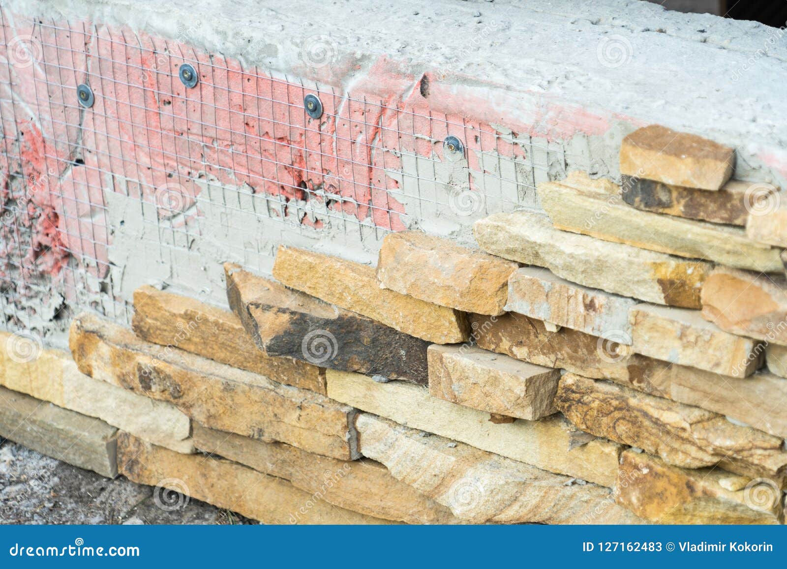 Stone Cladding Wall Made Of Stacked Slabs And Blocks Of Natural Gray ...