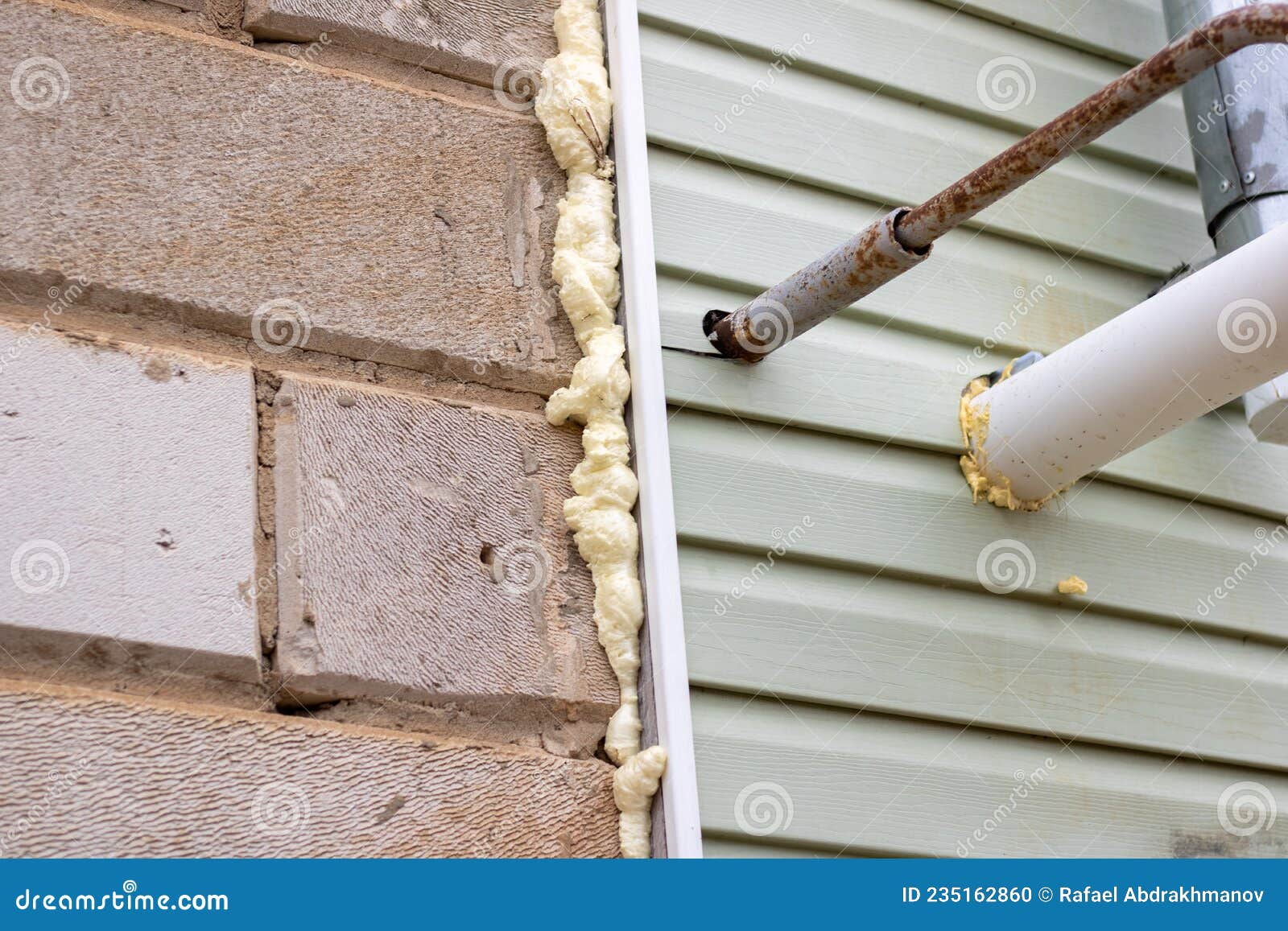 Wall Cladding with Siding. Foaming Insulation with Polyurethane Foam ...