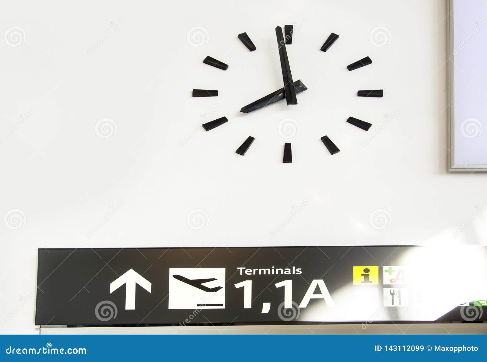 Wall Clock at an Airport with Navigation Panel Stock Image - Image of ...