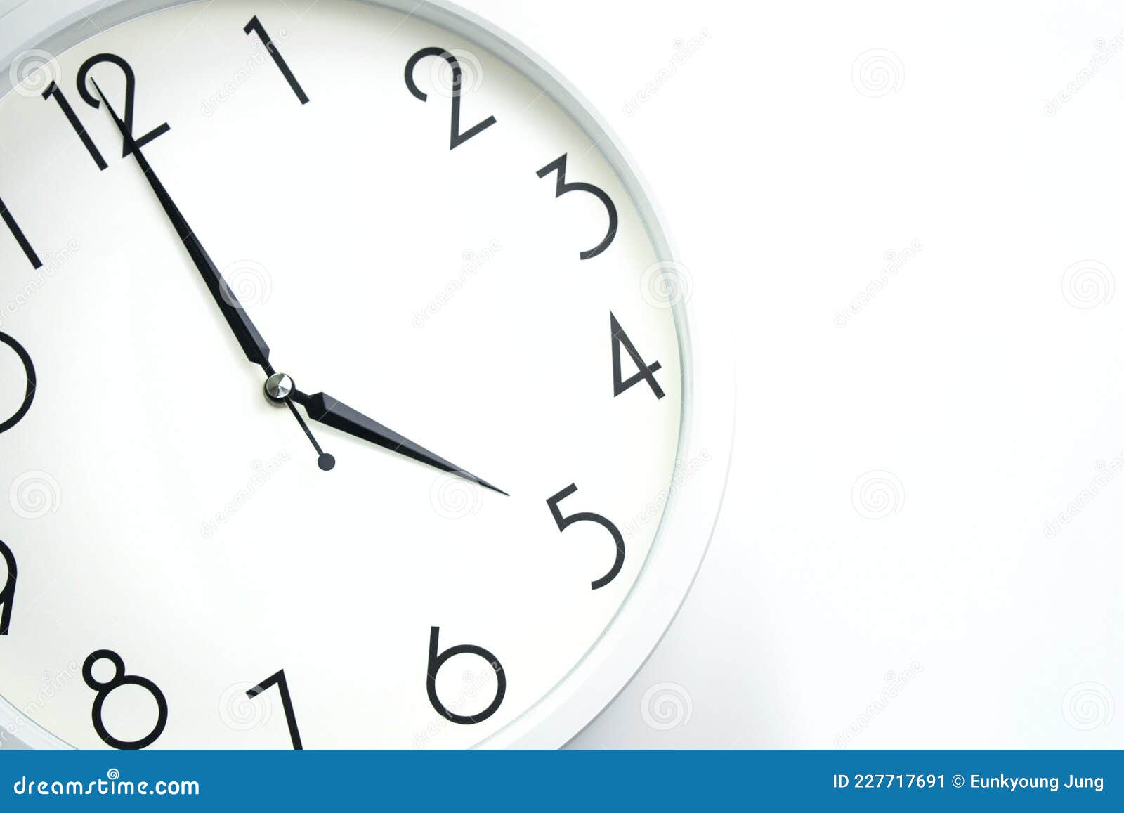 A Wall Clock that Announces 5 O Clock on the Hour Stock Image - Image ...