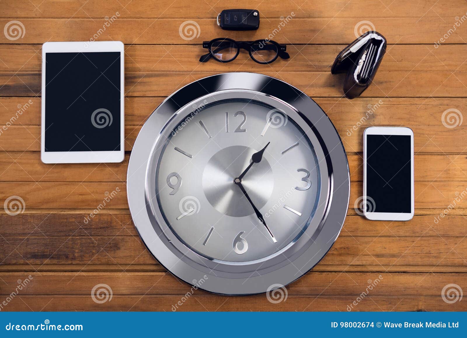 Wall Clock with Digital Tablet and Smart Phone Stock Photo - Image of ...