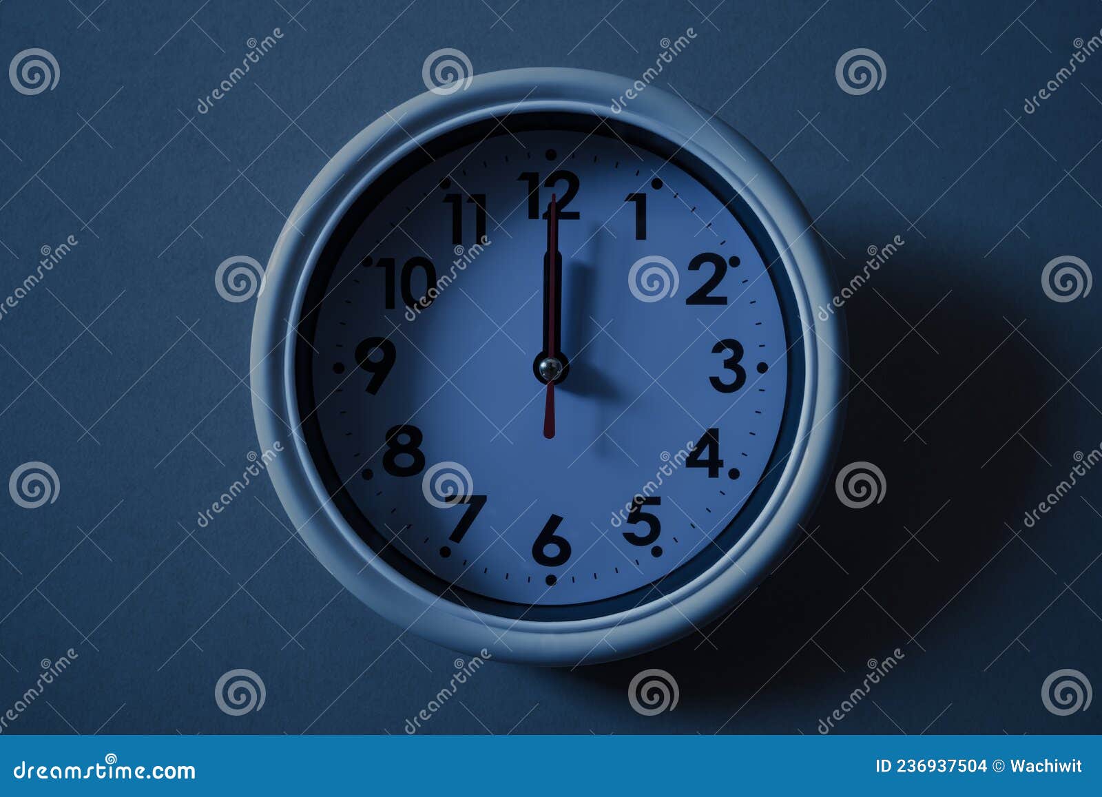 A Wall clock at midnight stock photo. Image of celebrate - 236937504
