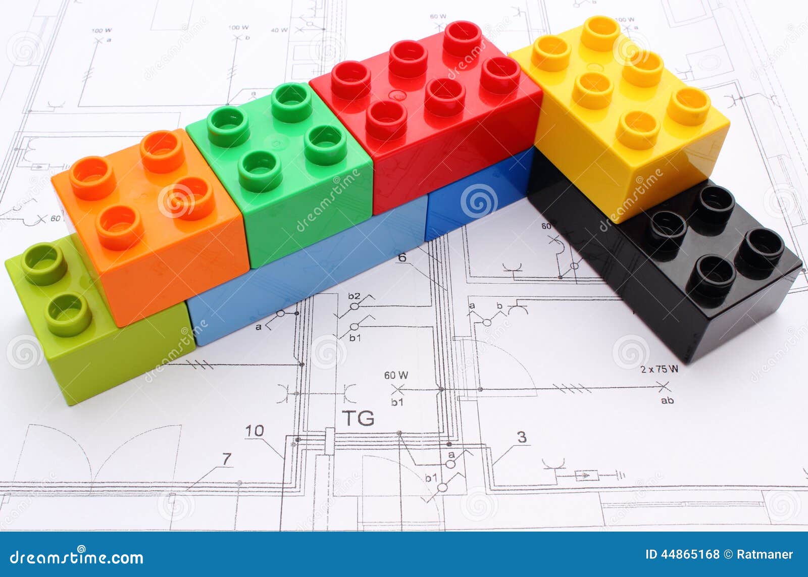 Wall of Colorful Building Blocks on Housing Plan Stock Photo - Image of ...