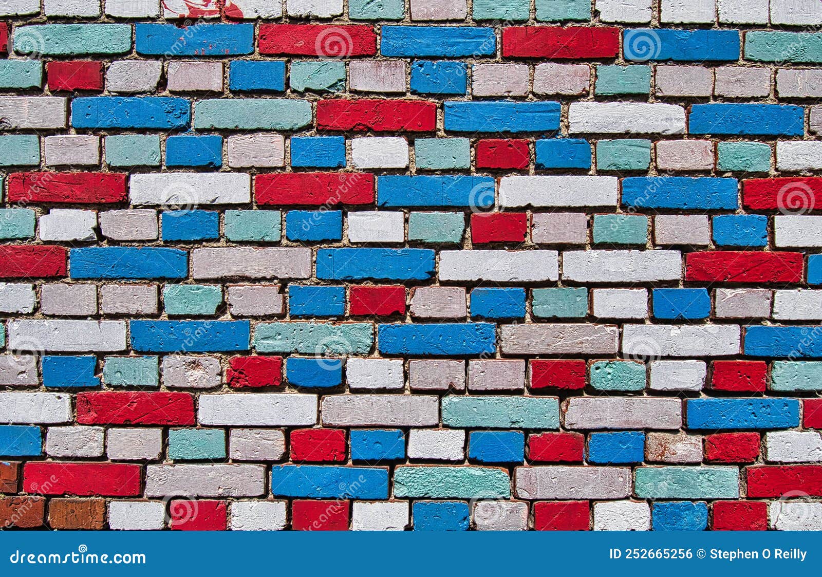 Wall of coloured bricks stock photo. Image of coloured - 252665256